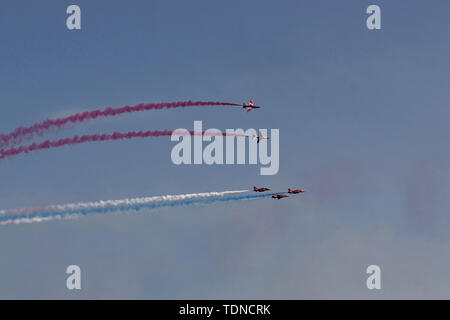 Red Arrows Roll Back Stock Photo - Alamy