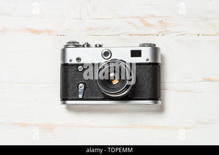 Old film camera on white background. Retro technology Stock Photo - Alamy