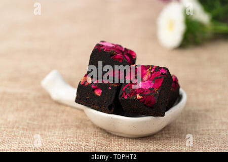 Roses, black sugar Stock Photo - Alamy