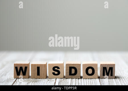Wisdom Word Written on Wood Stock Photo - Alamy