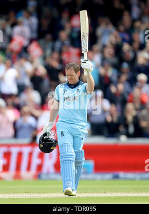 England's Eoin Morgan raises his bat after reaching fifty in batting ...