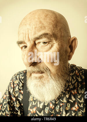 old bad-mooded man with a grey beard, Germany Stock Photo - Alamy