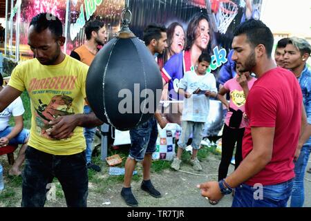 Women enjoy the Folklore costume ball prior to the traditional Ride of ...