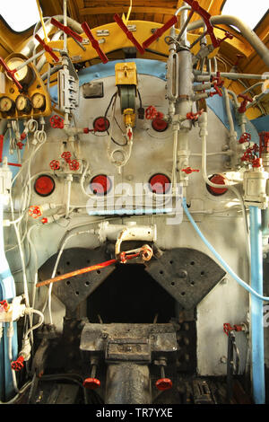 Interior of a cabin, cab of an old steam locomotive. Boiler, locomotive ...