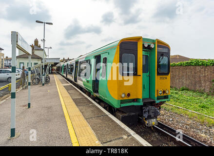 class 313 electric multiple unit train in the platform on the southern ...