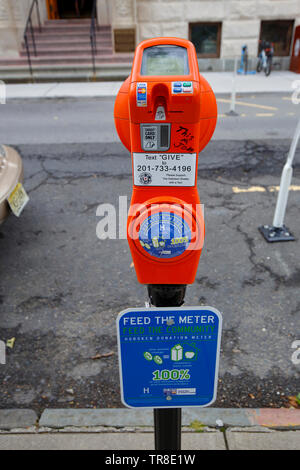 Parking meter for charity Stock Photo - Alamy