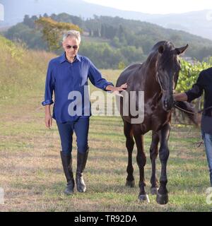 Andrea Bocelli (L) and his brother Alberto (R), pictured on the estate ...