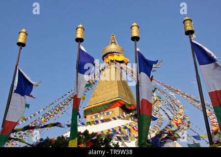 Boudhanath Tibetan Buddhist stupa with colorful prayer flags flying ...