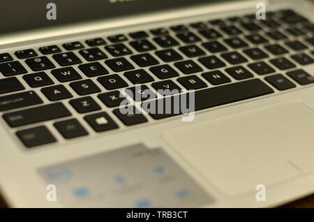 Abstract view of qwerty keyboard in an office setup Stock Photo - Alamy