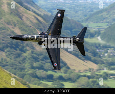 Royal Air Force Hawk T2 aircraft conducting low flying training through ...