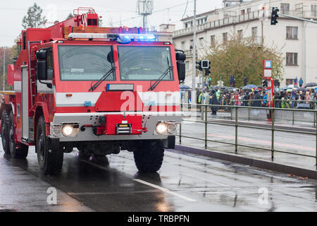 Fire brigade workers are riding fire truck on military parade in Prague ...