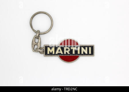 Key ring with martini logo, isolated on white background, close-up ...