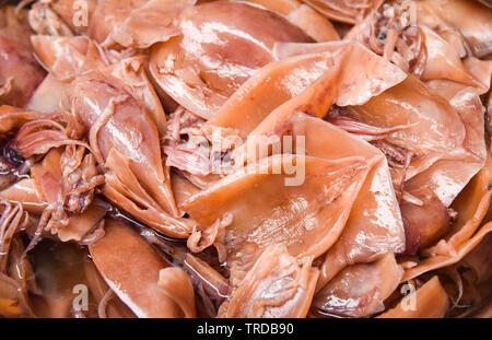 Pickled squid on tray in the market Stock Photo - Alamy