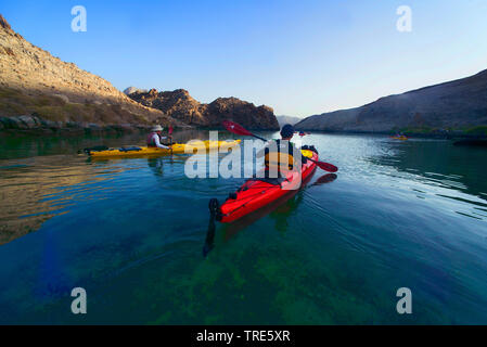 sea kayaking in bay of Sham in the Strait of Hormuz, Oman, Musandam ...