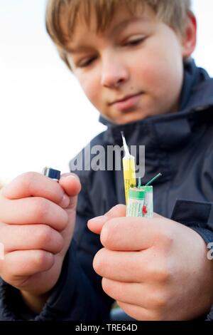 A firecracker banger firework on a white background Stock Photo - Alamy