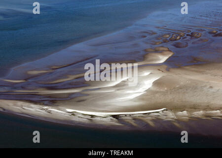 Tidal flat and sandbanks during low tide along the dunes of the island ...