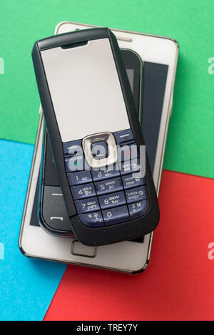 Obsolete cellphone on white background. Studio shoot Stock Photo - Alamy