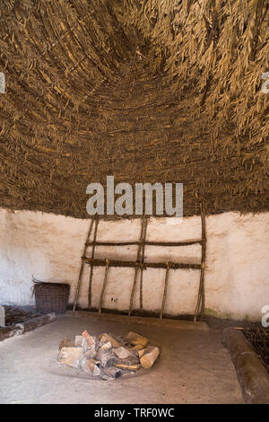 Thatched roof ceiling inside a recreated Neolithic stone age hut ...