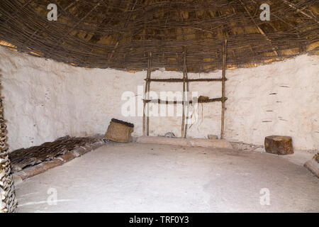 Thatched roof ceiling inside a recreated Neolithic stone age hut ...