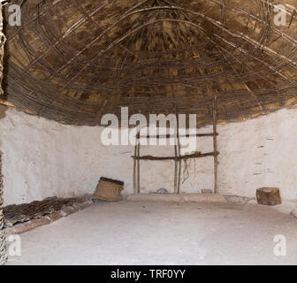 Thatched roof ceiling inside a recreated Neolithic stone age hut ...