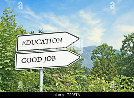 Road sign to eduacation and good job Stock Photo - Alamy