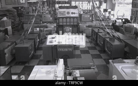 1960 1960s DISPLAY OF COLOR TELEVISION SETS FOR SALE DEPARTMENT STORE ...