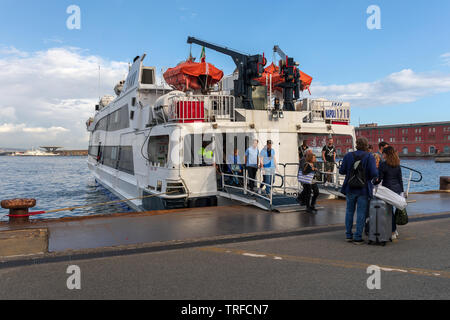 Naples, Italy - May 30, 2019: passengers get off the hydrofoil through ...