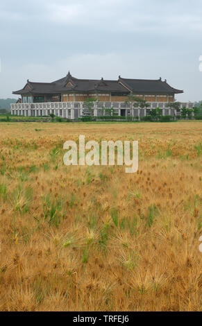 Rural farm house at the end of field at winter. Lahemaa national park ...
