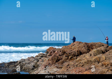 Fishermen fishing off the beach at durban, south africa Stock Photo - Alamy