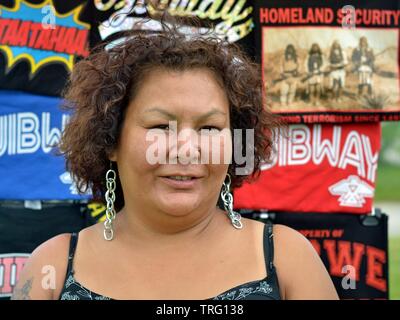 Canadian Ojibwe First Nations woman wears her traditional regalia and ...