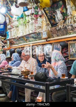 Azadegan tea house, Isfahan, Iran with cakes, sweets, tea, water pipe ...