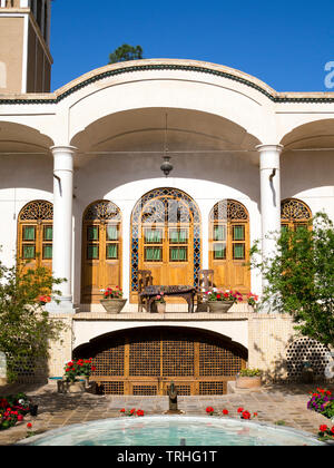 The courtyard of Morshedi House, an old merchant house converted into a ...
