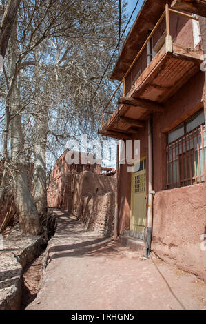 An alleyway in Abyaneh, a village with a unique red hue and one of Iran ...