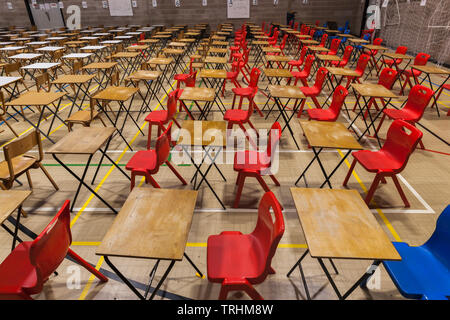 Exam tables and chairs set up in a UK school Stock Photo - Alamy