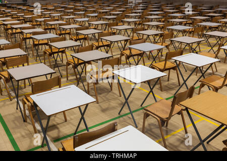 Exam tables and chairs set up in a UK school Stock Photo - Alamy