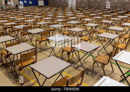 Exam tables and chairs set up in a UK school Stock Photo - Alamy