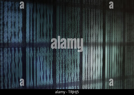 Binary code computer theme background. selective focus image of led display showing computer ...