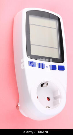 Digital Power Meter on pink background Stock Photo - Alamy