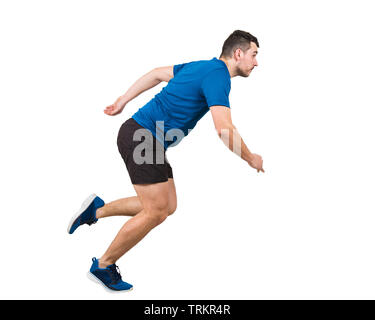 Side view of determined man sprinter standing in running position, at ...