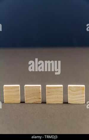 Four wood blocks against dark background, graphic resource, template ...