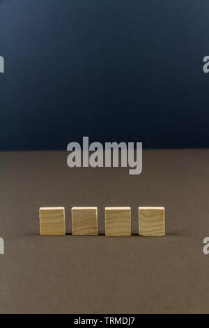 Four wood blocks against dark background, graphic resource, template ...