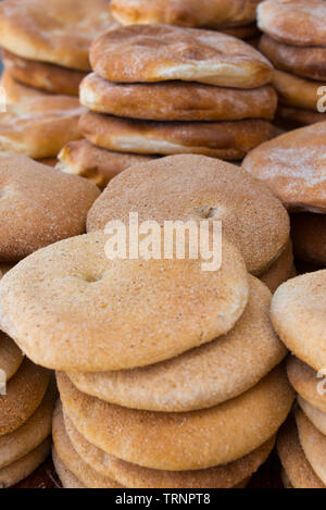 A traditional bakery in Marrakech, Morocco: people prepare their doughs ...