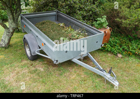 Trailer full of garden waste Stock Photo - Alamy