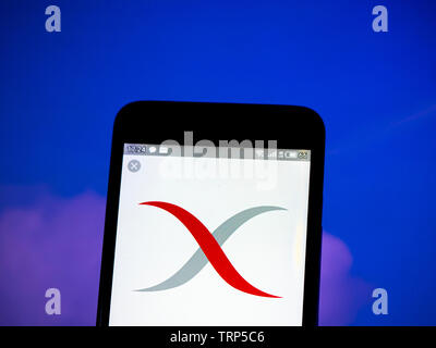 In this photo illustration the JetSuiteX logo is seen displayed on a ...
