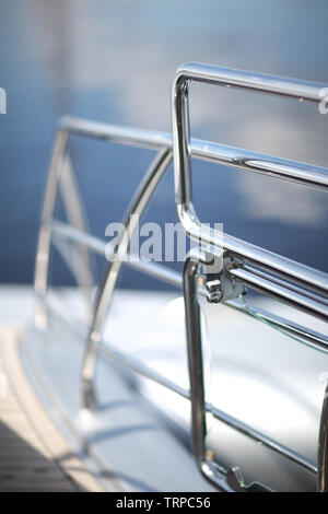 Shiny silver water on the sea pebble beach, early morning sunrise Stock ...