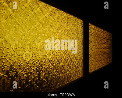 green color glass with thai pattern Stock Photo - Alamy