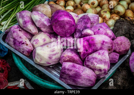 Purple taro in local market in Saigon Stock Photo - Alamy