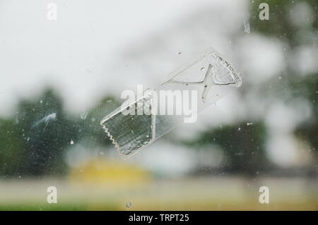 adhesive tape stain on window glass shield and wash bubble Stock Photo ...
