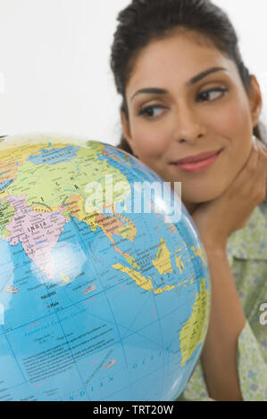 businesswoman dreaming at world map Stock Photo - Alamy
