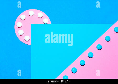 Triangle of White Pills With Blue Pill On Top USA Stock Photo - Alamy